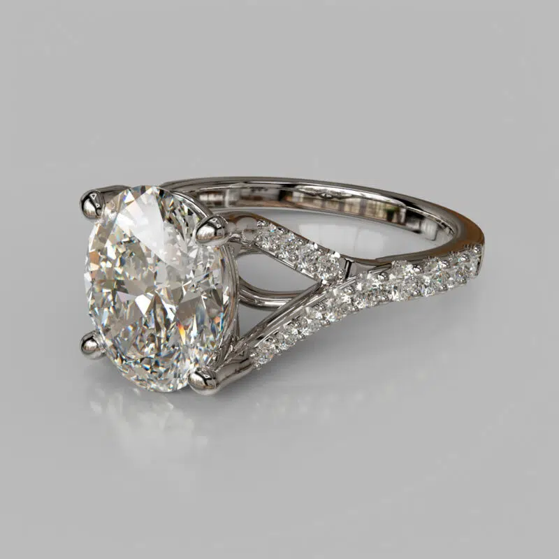 Graduated Split Shank Oval Cut Moissanite Engagement Ring - Forever ...